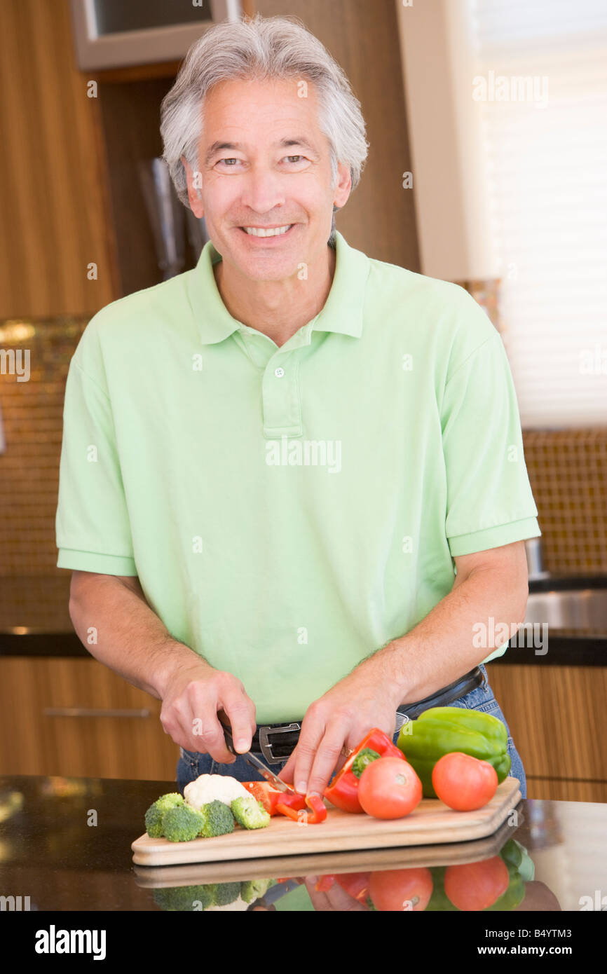 Man Chopping Vegetables Stock Photo - Alamy