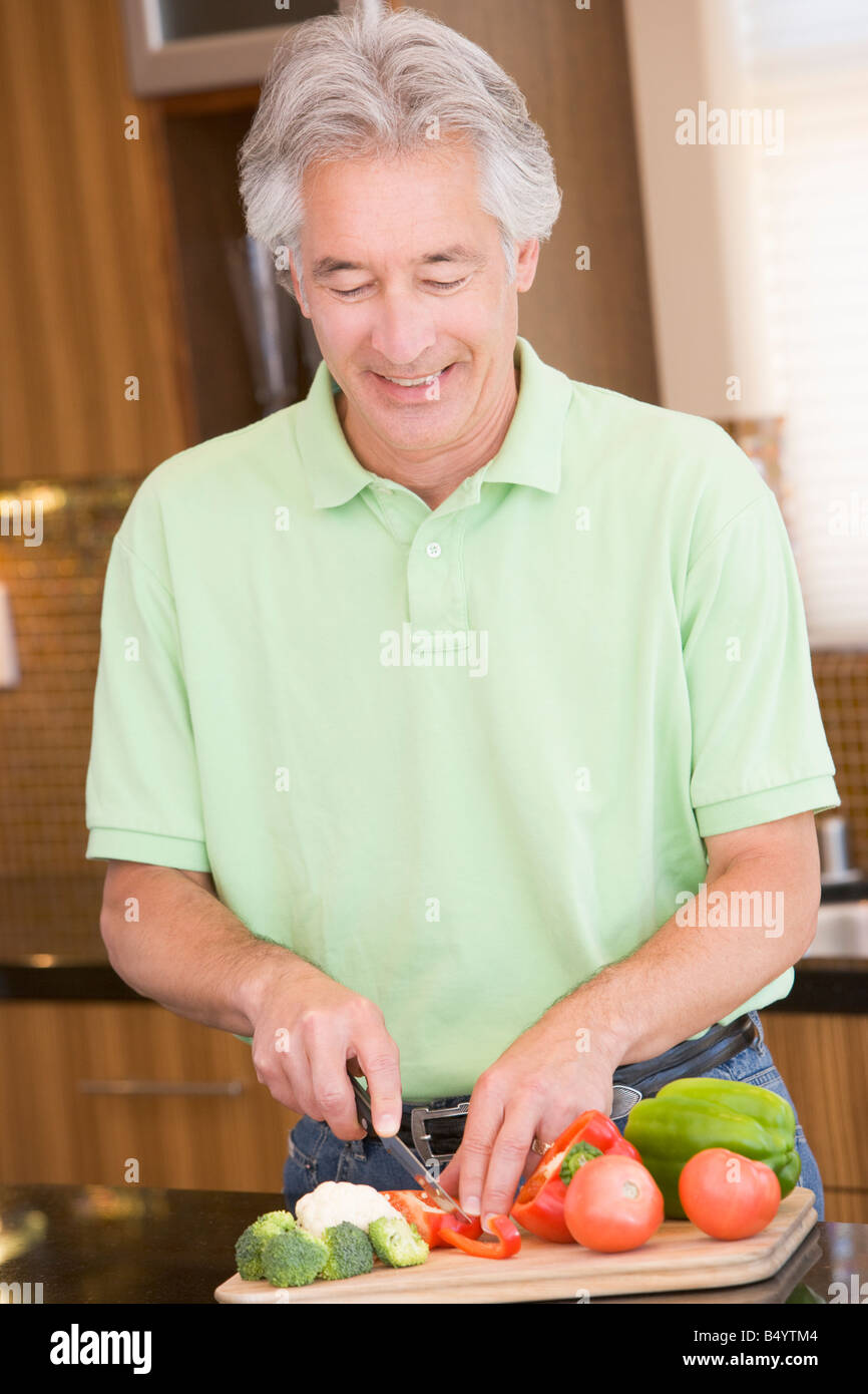 Man Chopping Vegetables Stock Photo - Alamy