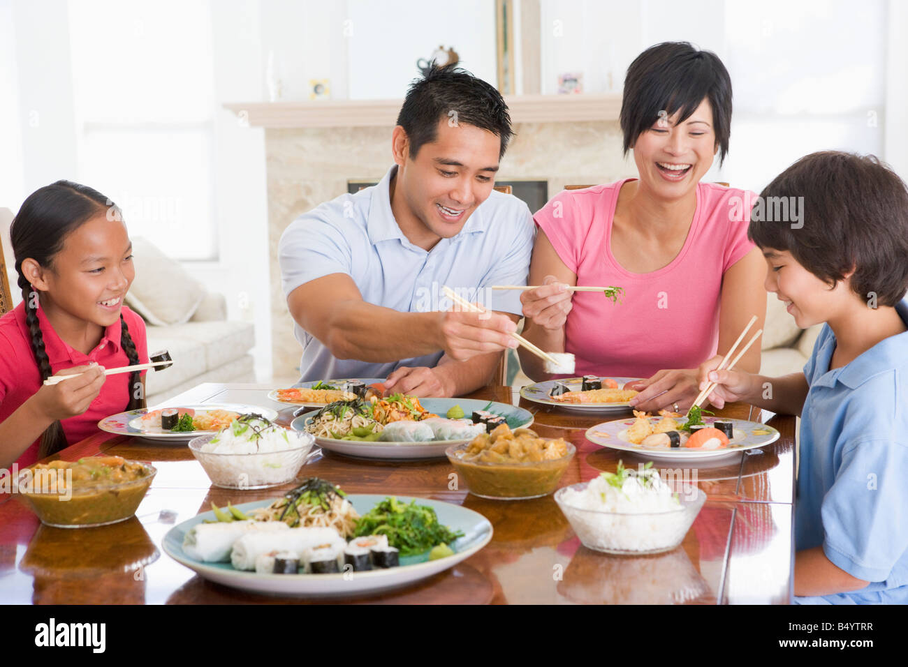 Asian brother sister dining table hi-res stock photography and images ...