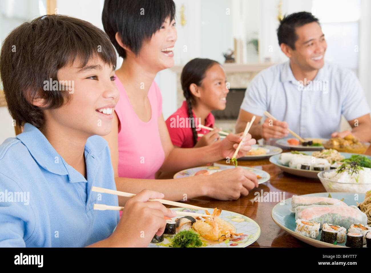 Chinese family eating together hi-res stock photography and images - Alamy