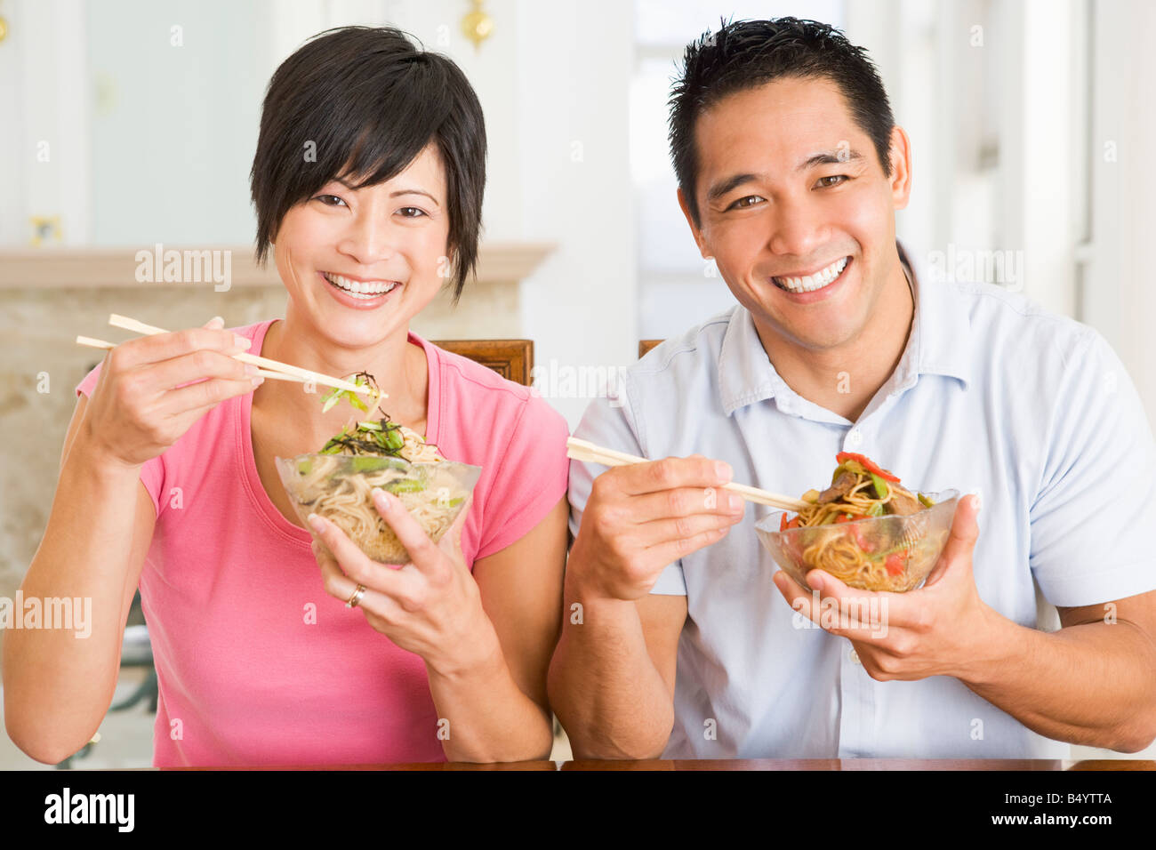 Husband wife eating chinese food hi-res stock photography and images ...