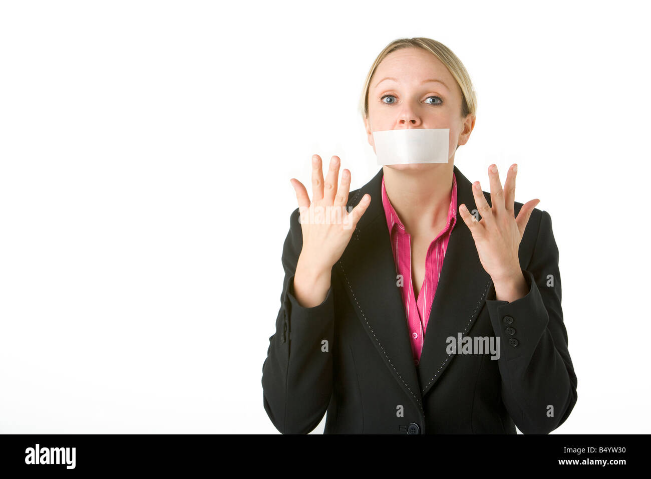Businesswoman With Her Mouth Taped Shut Stock Photo - Alamy