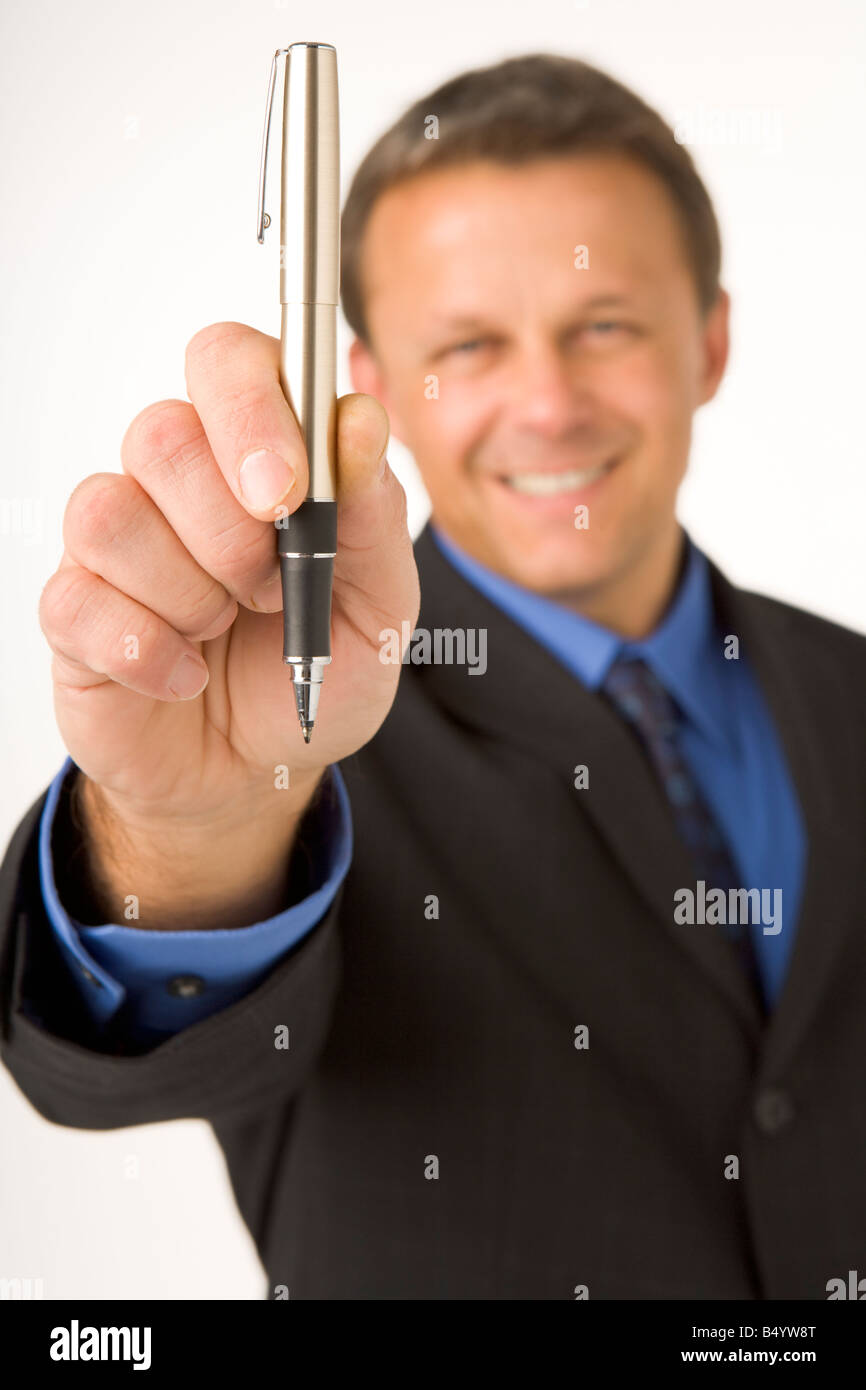 Businessman Holding A Pen Stock Photo - Alamy Businessman Holding A Pen Stock Photo - Alamy