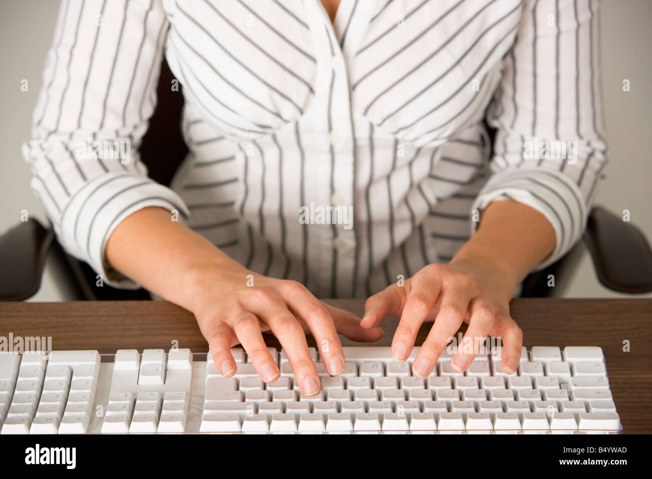 Cropped shot young businesswoman typing hi-res stock photography and ...