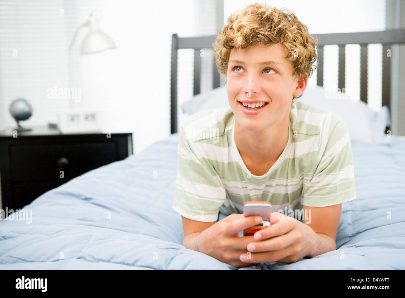 Teen Staring At Phone High Resolution Stock Photography and Images - Alamy