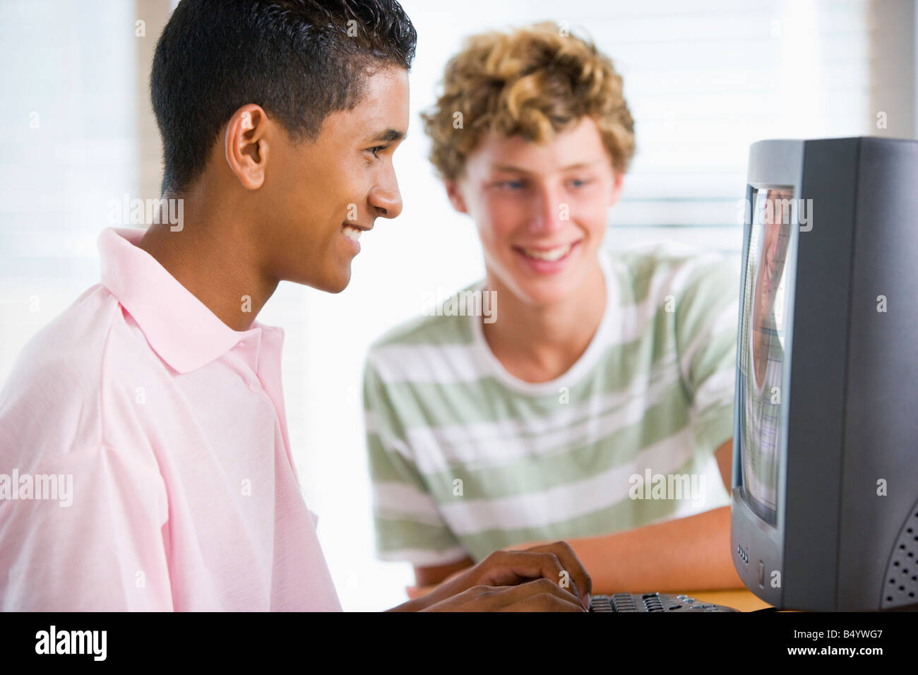 Teenage Boys Using Desktop Computer Stock Photo - Alamy