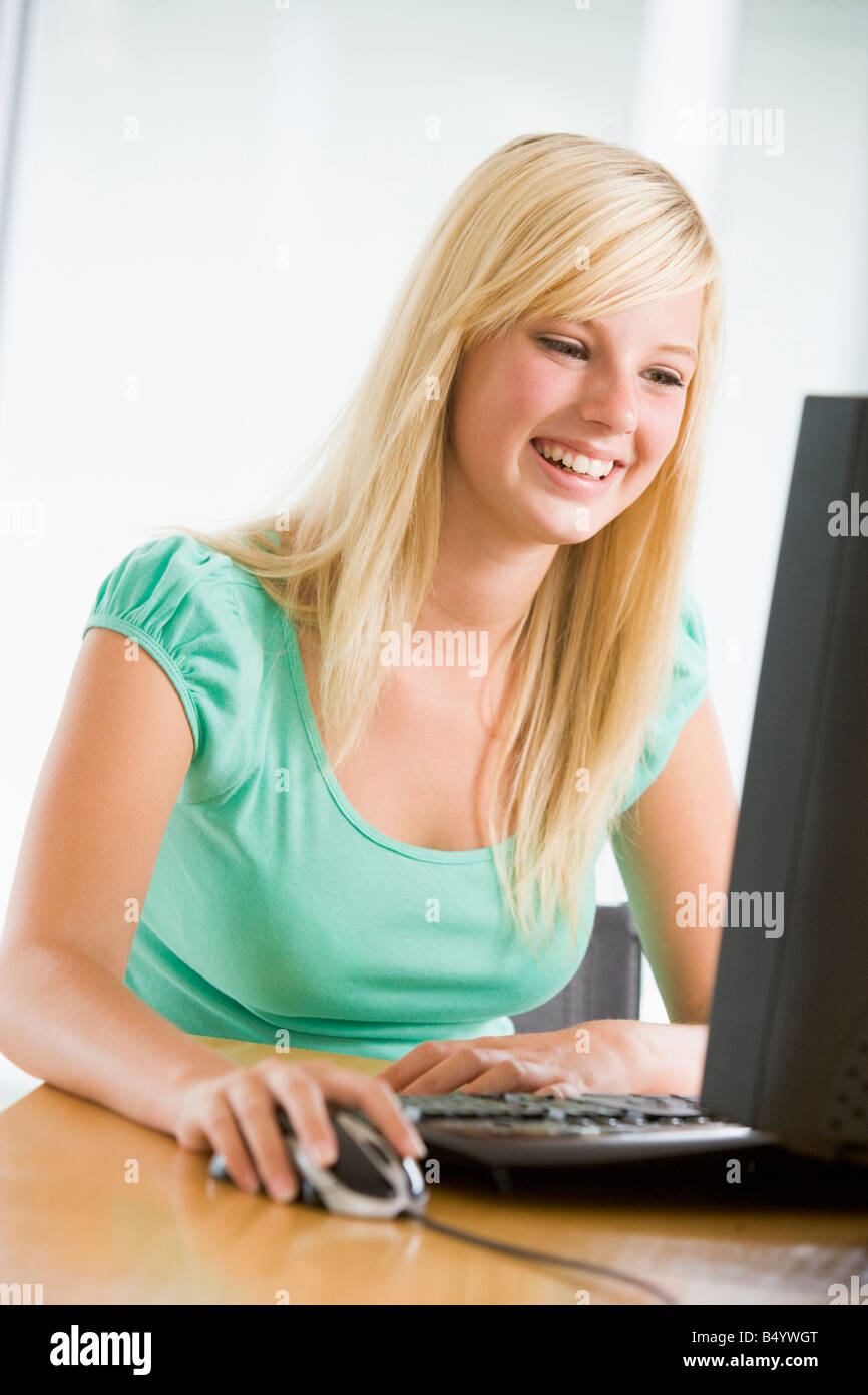 Teenage Girl Using Desktop Computer Stock Photo - Alamy