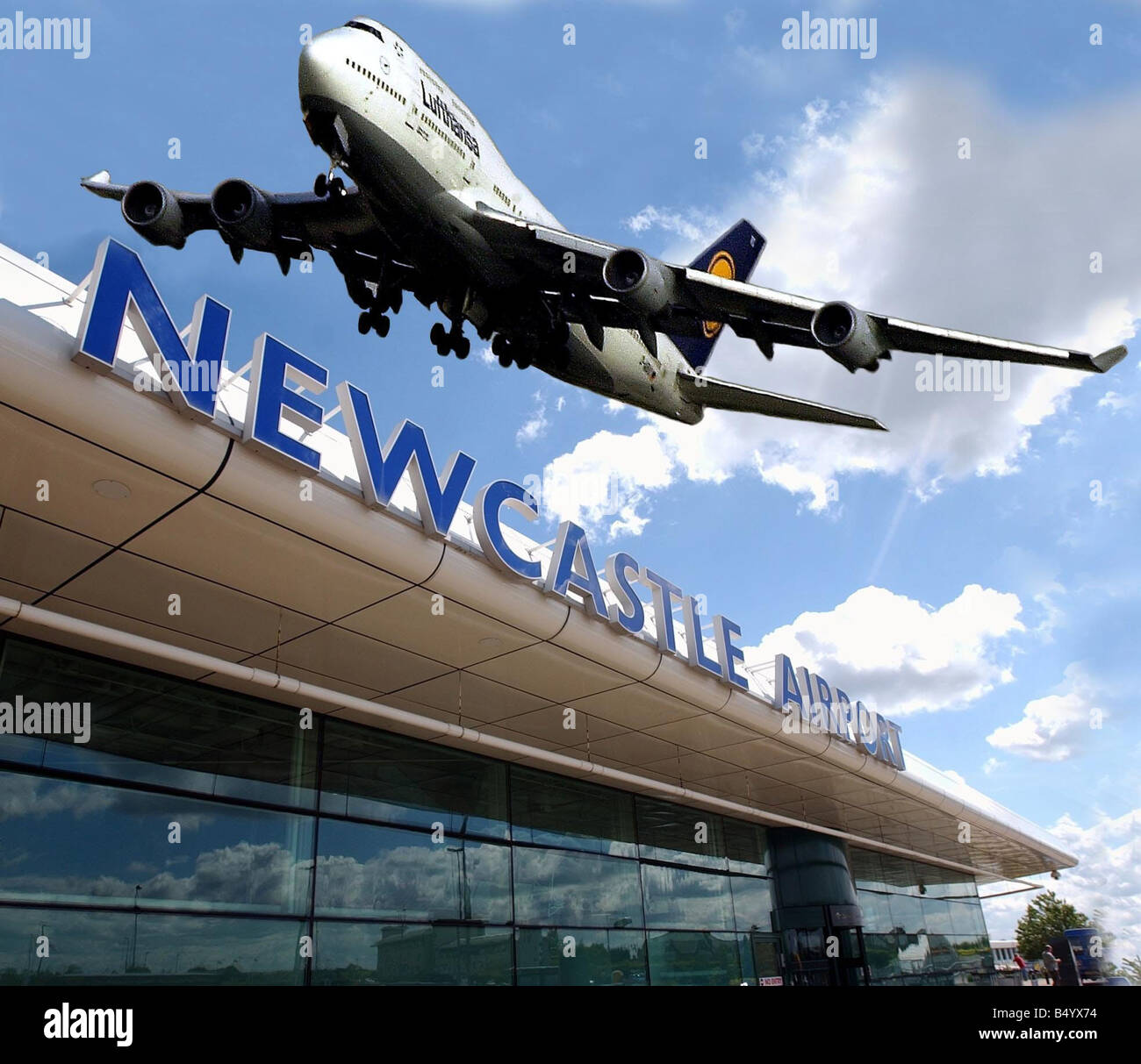 A Boeing 747 aeroplane flying over Newcastle Airport Stock Photo - Alamy