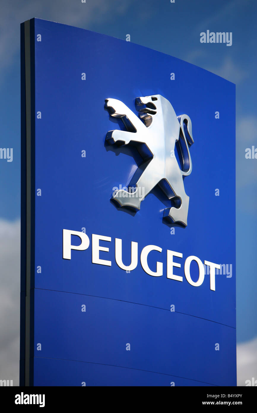 Peugeot sign with chrome logo Stock Photo - Alamy