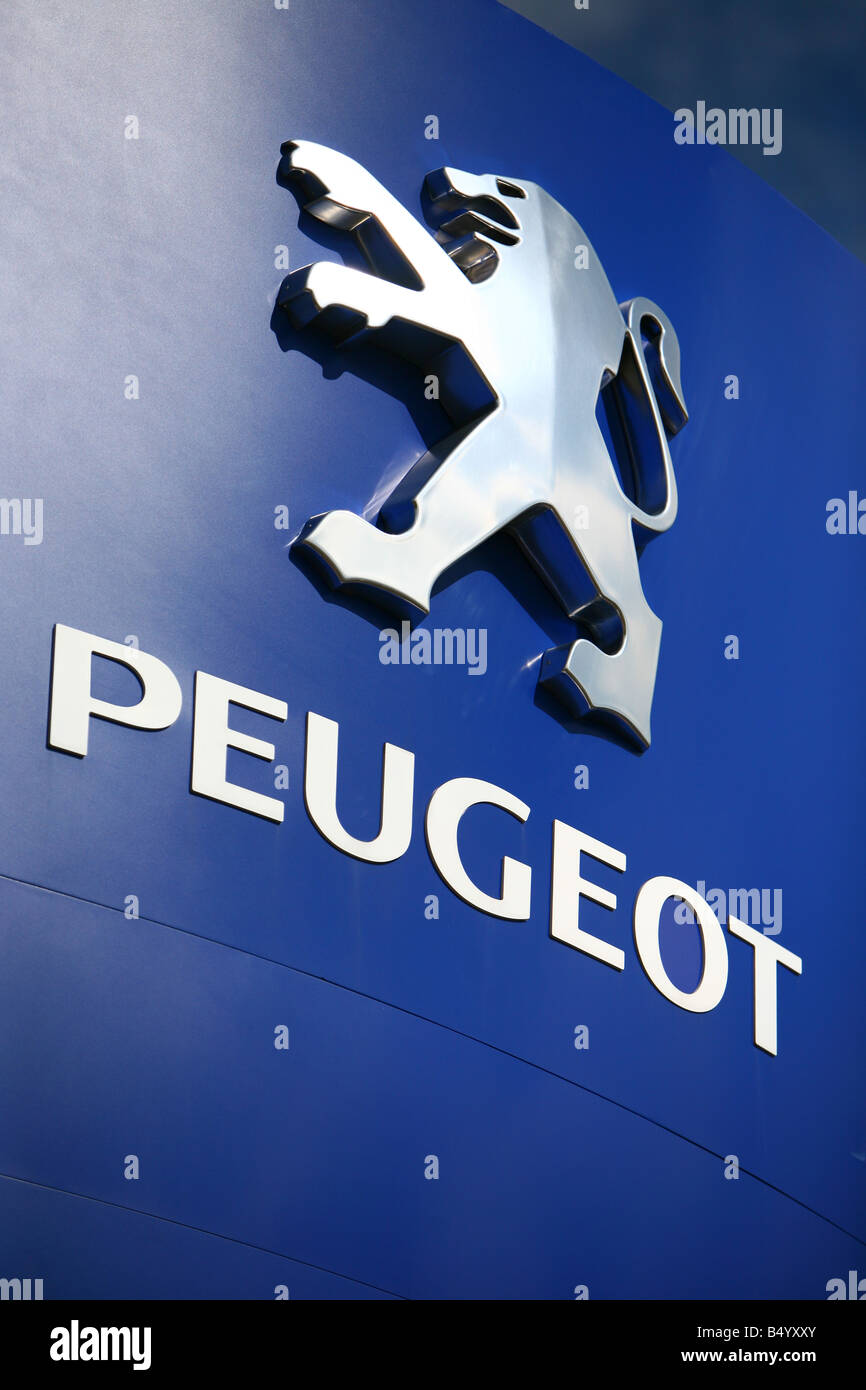 Peugeot sign with chrome logo Stock Photo - Alamy
