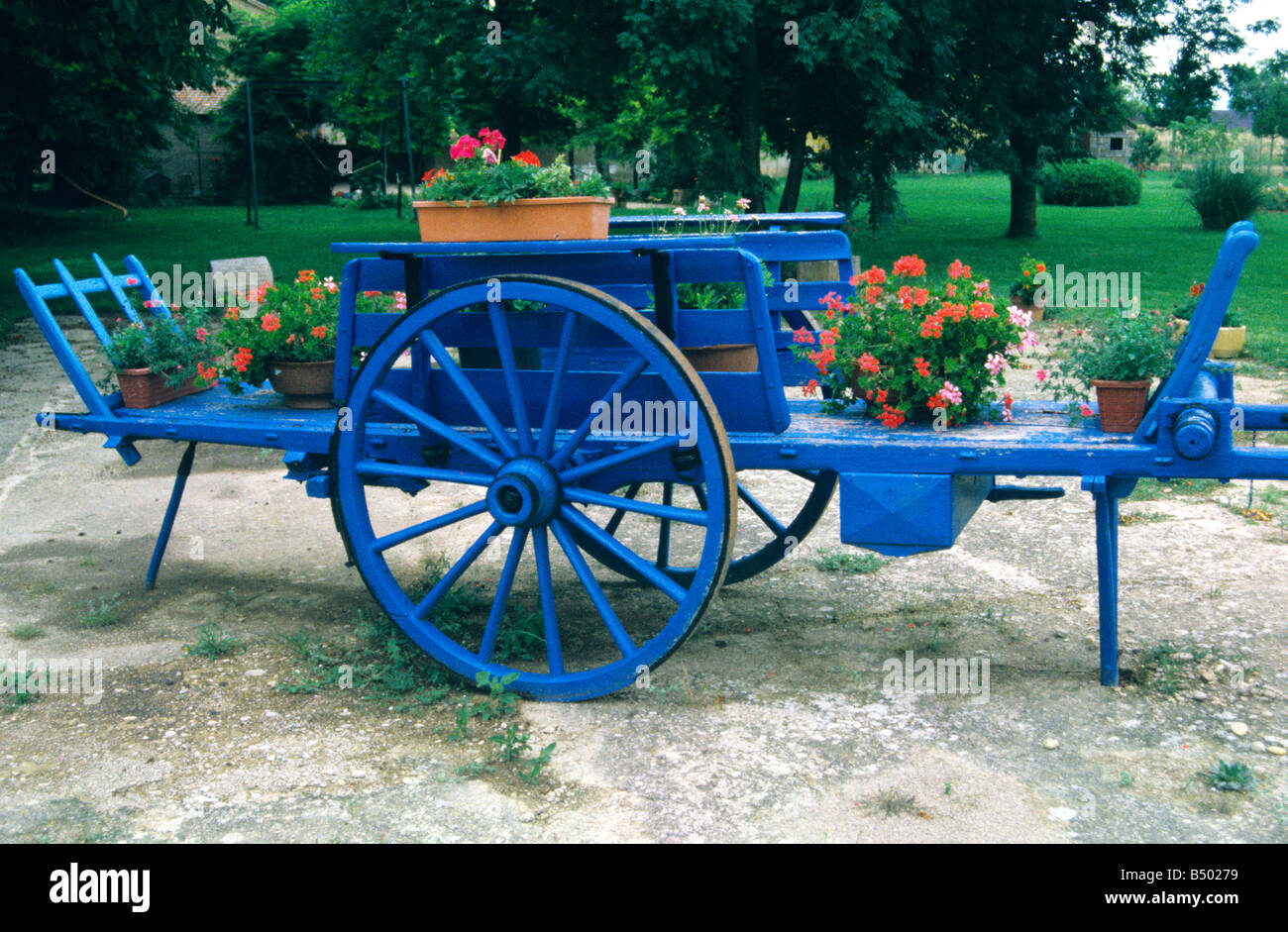 A decorative blue farm cart in Provence Stock Photo - Alamy