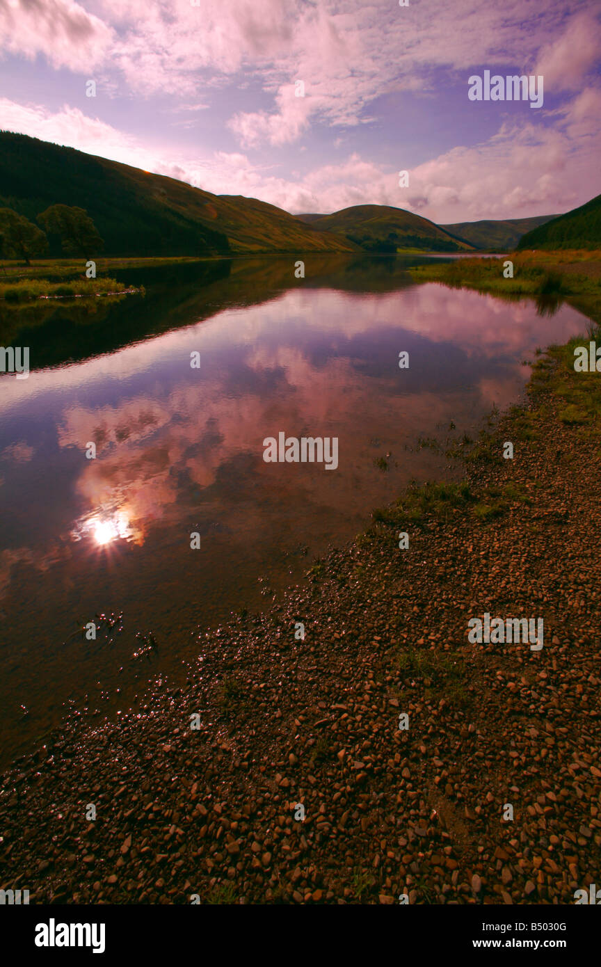 A portrait view looking south across the mirror like surface of Loch of ...