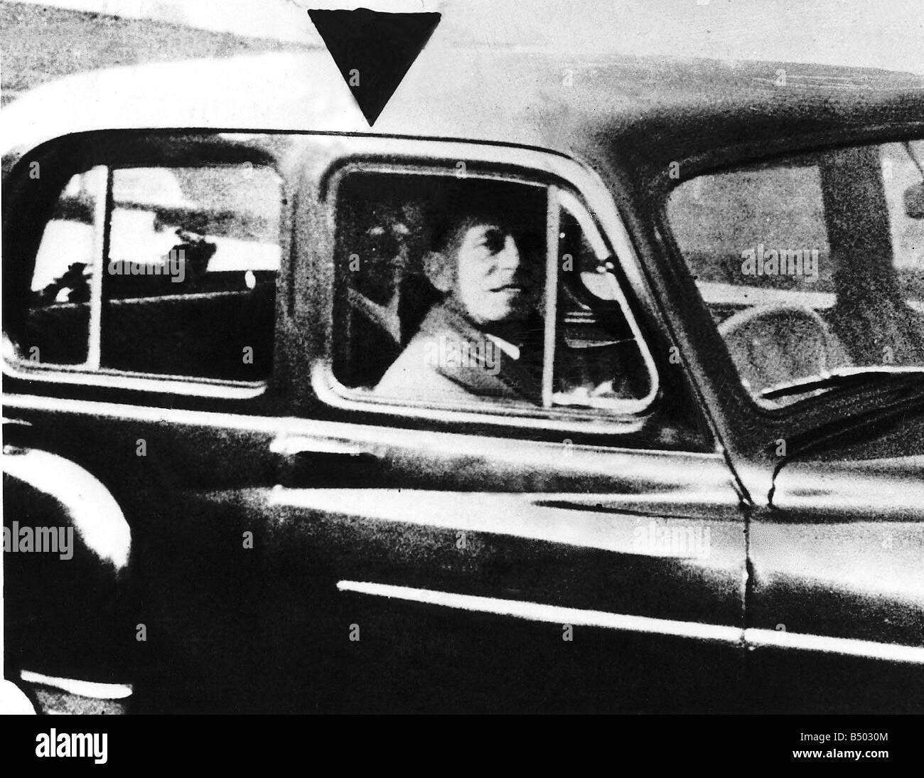 Ghost in the back of car taxi Stock Photo - Alamy