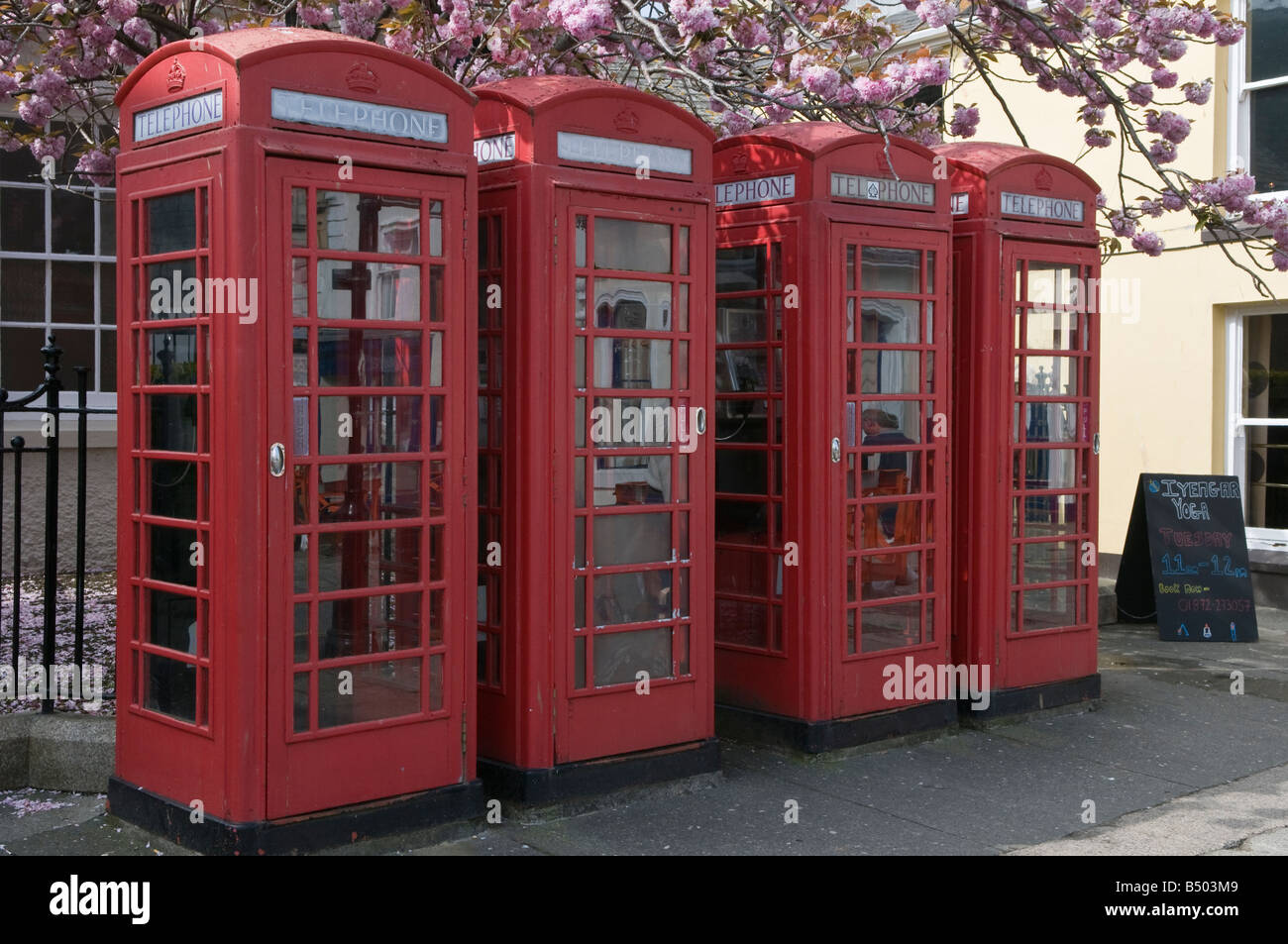 A row of four BT red telephone boxes, Truro Cornwall Stock Photo - Alamy