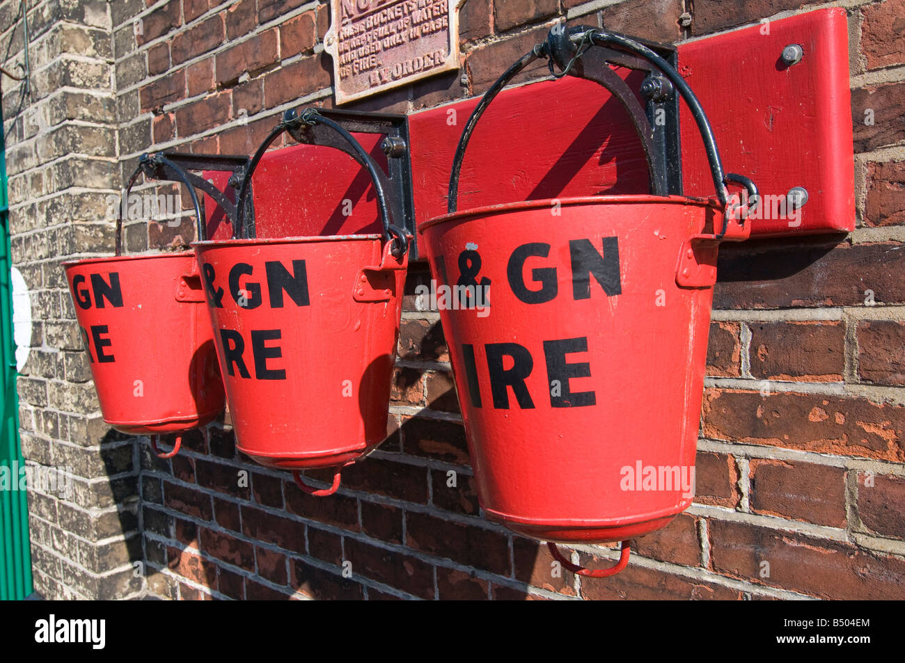 1940s red fire buckets hi-res stock photography and images - Alamy