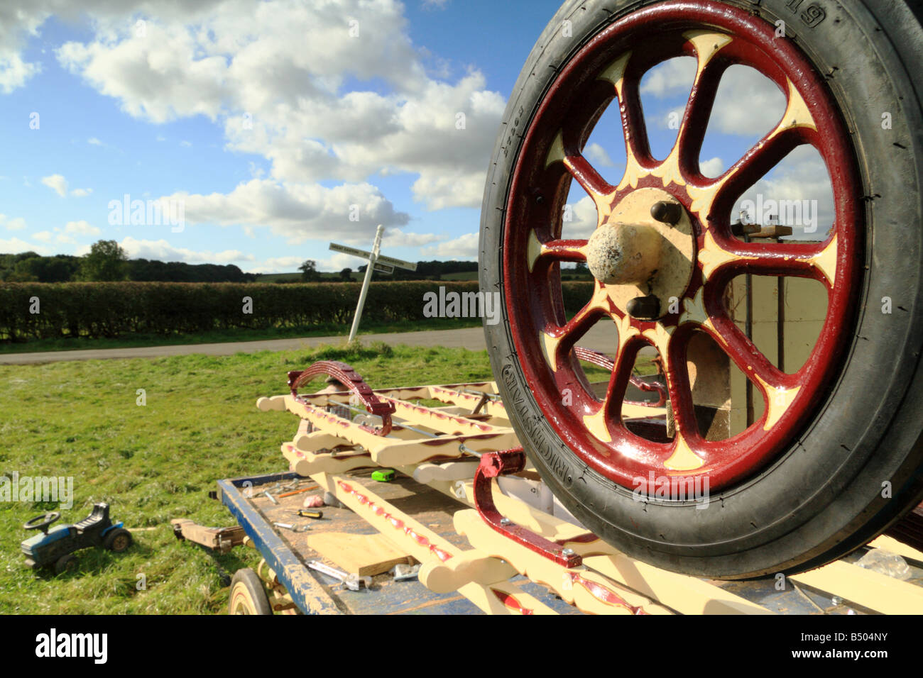 A gypsy caravan wheel in the foreground of an English rural scene Stock ...