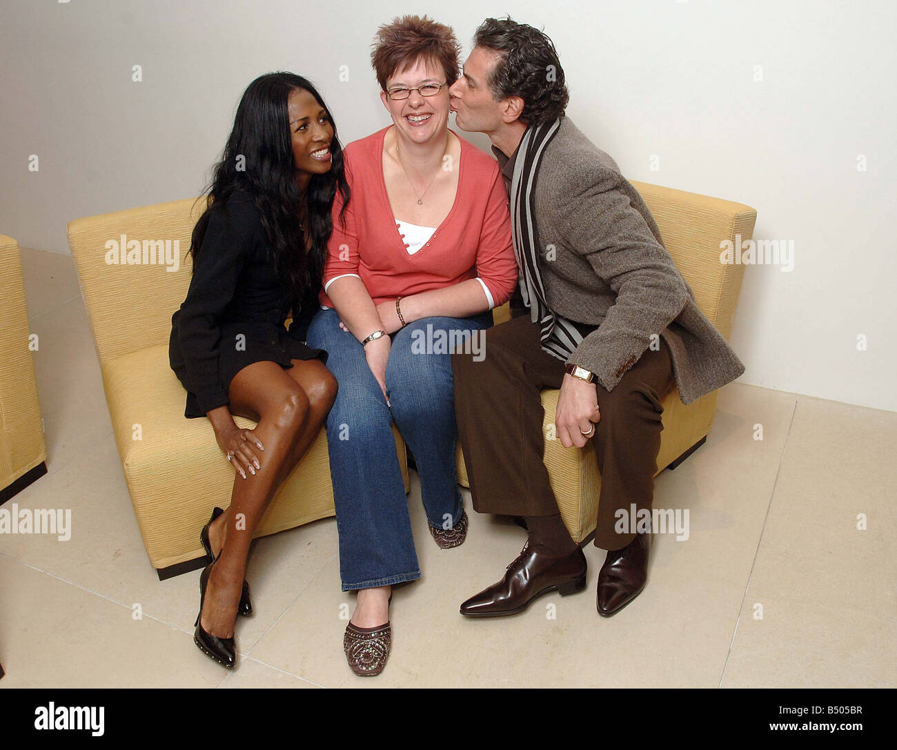 Ex Pop star Sinitta and husband Andy Willner pictured with surrogate ...