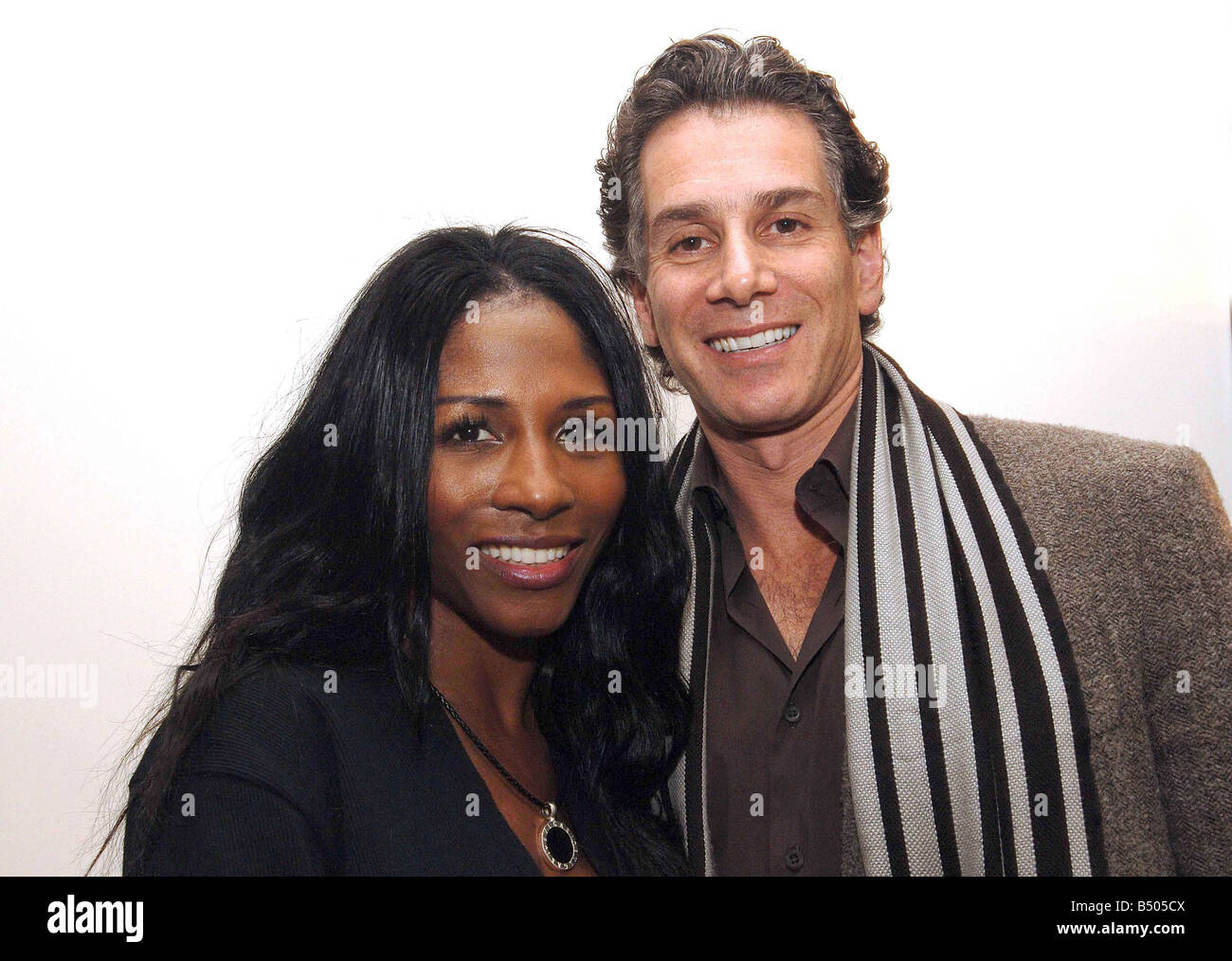 Ex Pop star Sinitta and husband Andy Willner pictured with surrogate ...