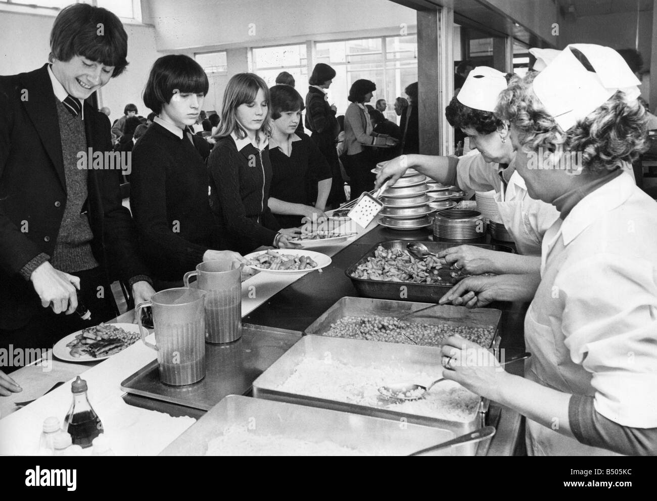 Pupils at Hirst High School in Ashington queue for their school dinner ...