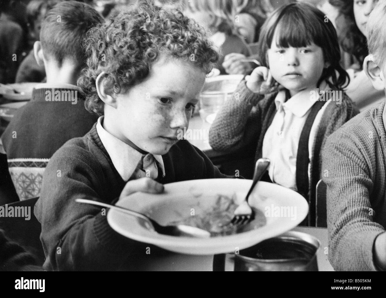 Please sir I want some more this little boy has enjoyed his school meal ...