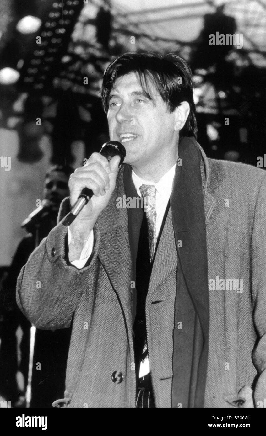 Bryan Ferry Singer with Pop Group Roxy Music singing on stage wearing ...