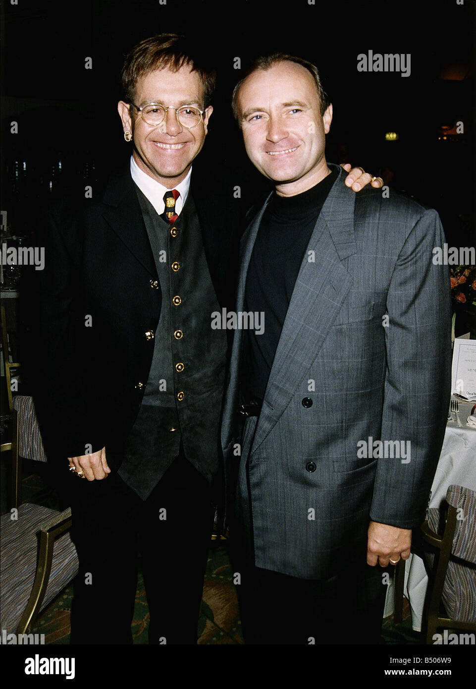 Elton John Rock Singer with a friend Phil Collins Stock Photo - Alamy