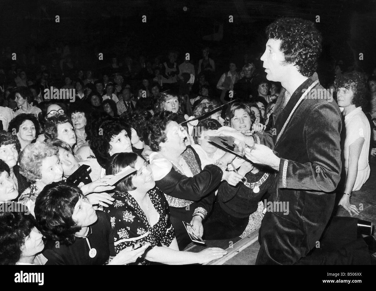 Tom Jones Welsh pop star performs live on stage to excited audience ...