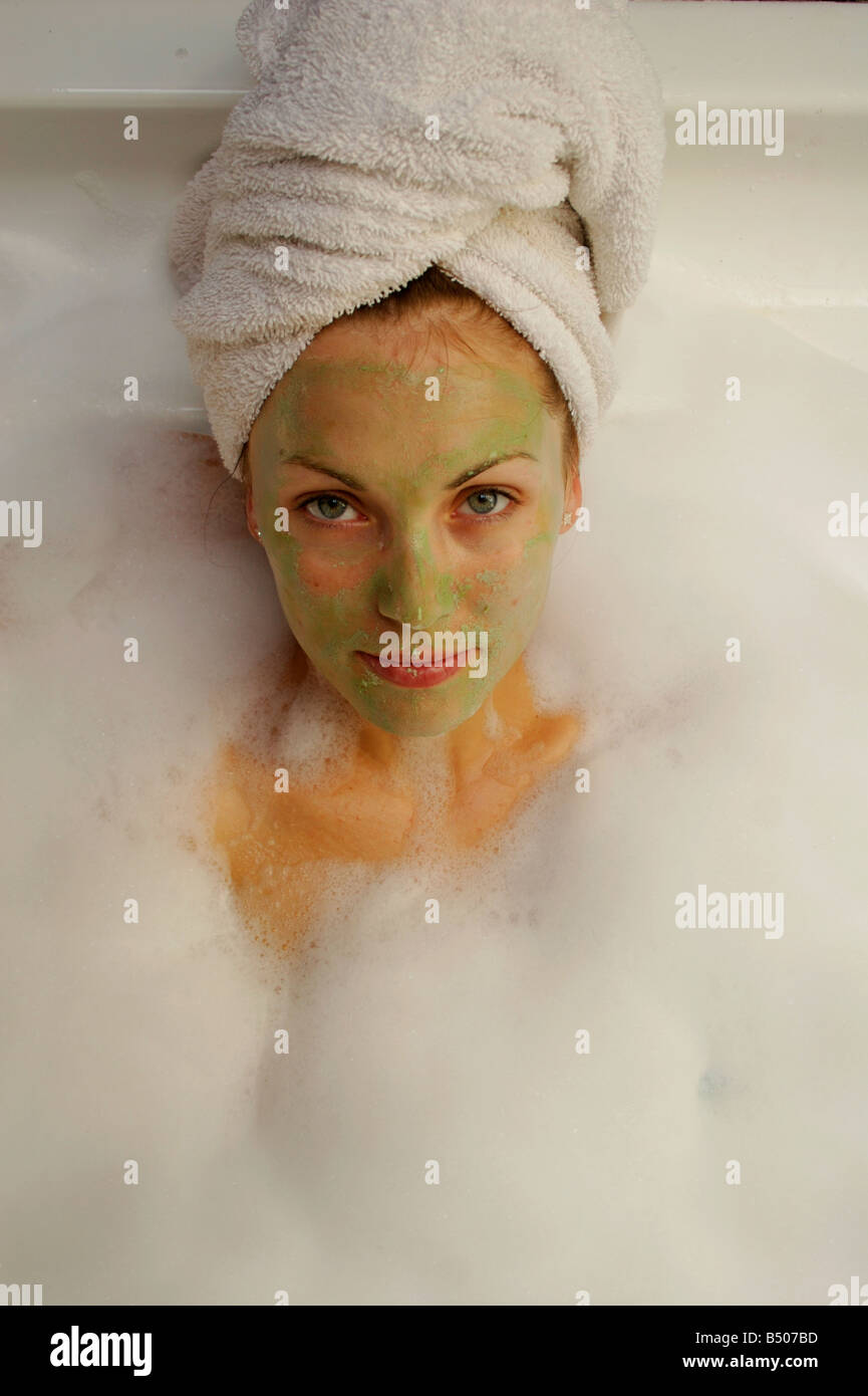 An attractive young lady relaxing in a bubble bath Stock Photo - Alamy