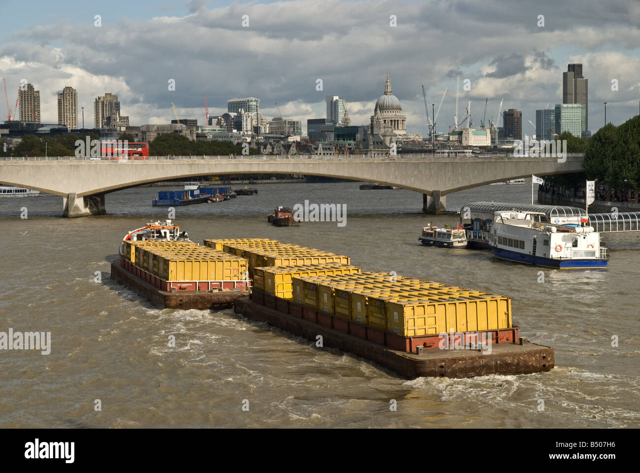 LARGE CARGO BOAT CARRYING CONTAINER ON THE RIVER THAMES Stock Photo - Alamy