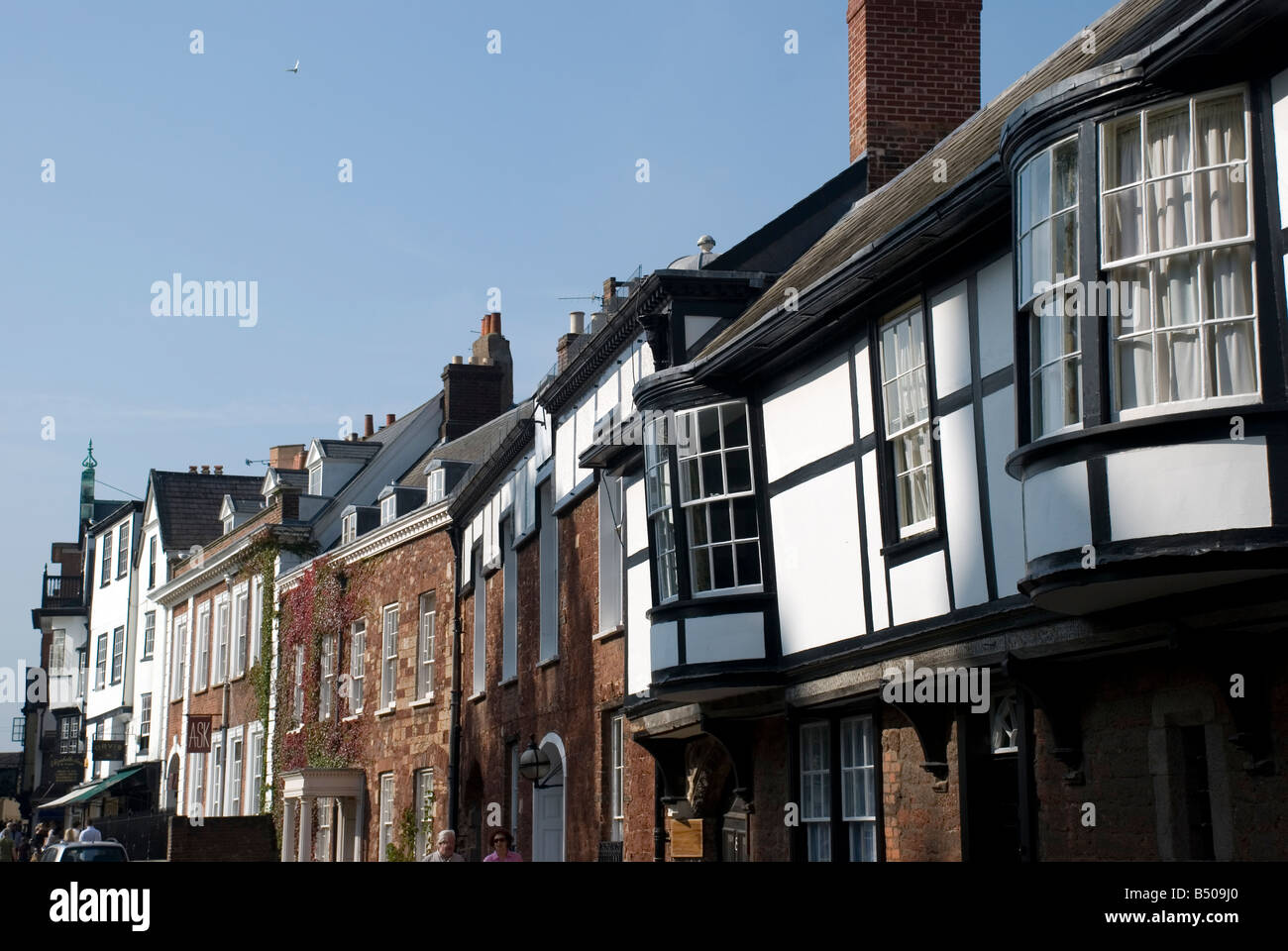 Row of medieval buildings in the cathedral close exeter hi-res stock ...
