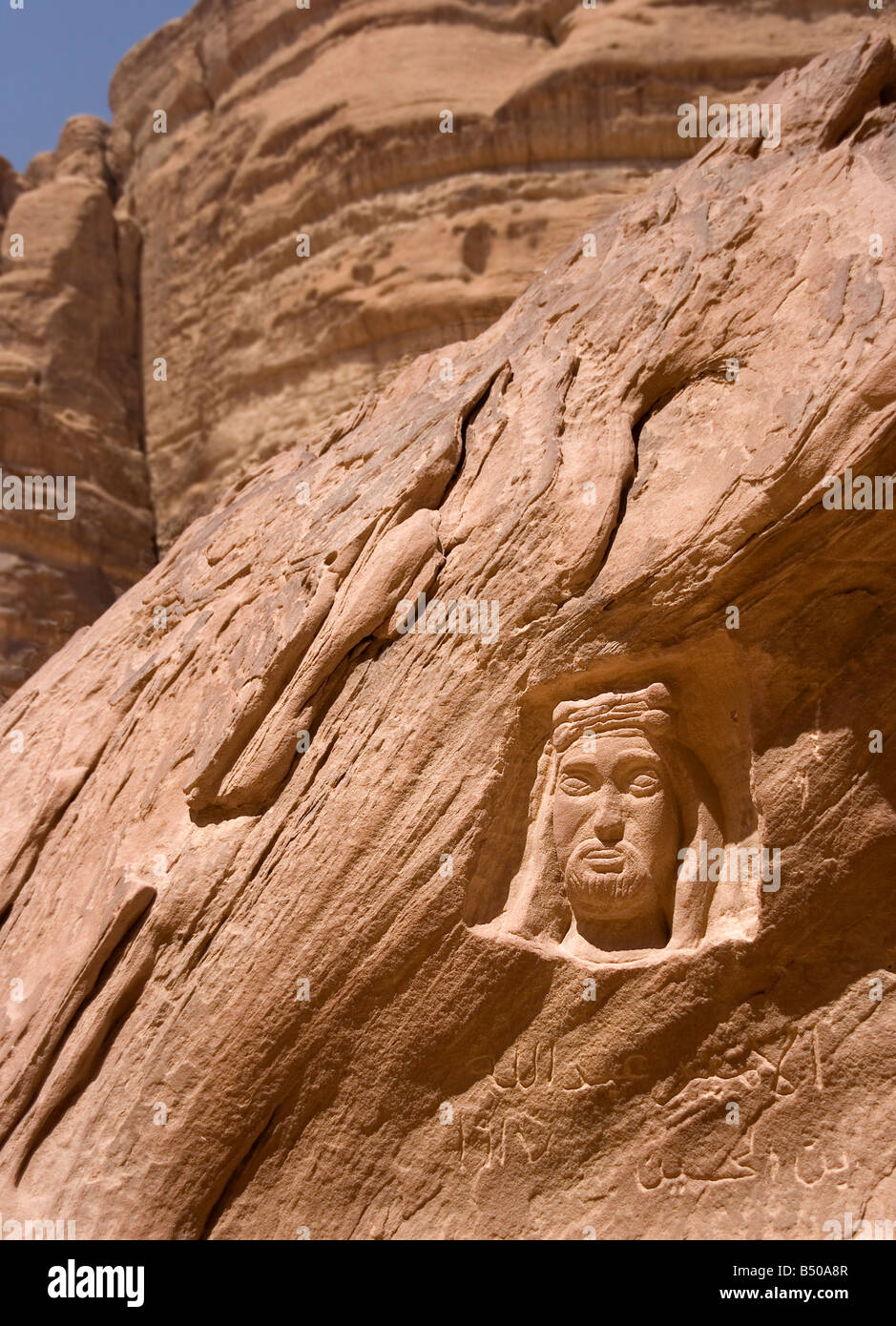 Face relief in Wadi Rum desert Stock Photo - Alamy