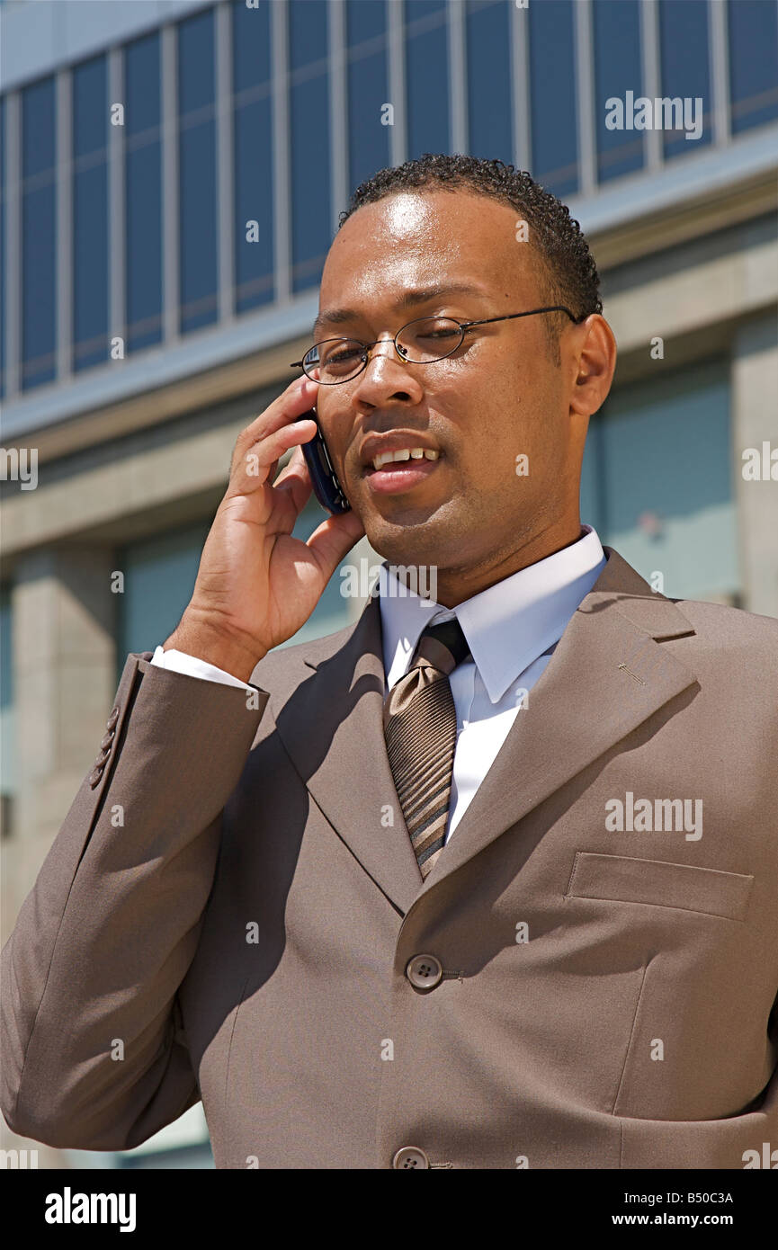An confident and successful African American businessman in a power ...