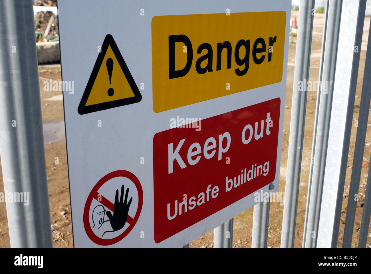 Danger keep out warning sign on gate Stock Photo - Alamy