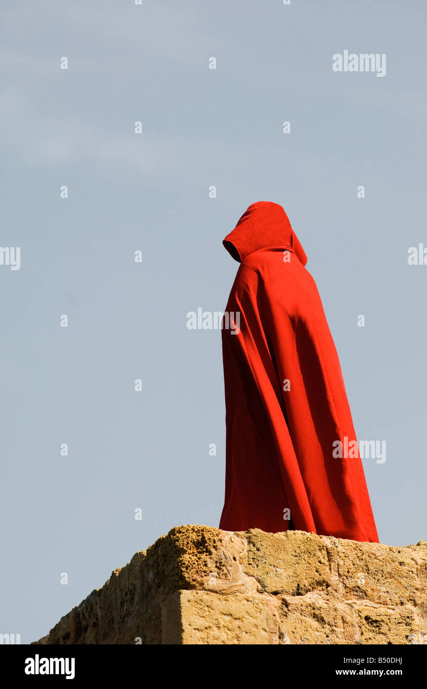 Red Cloaked Figure