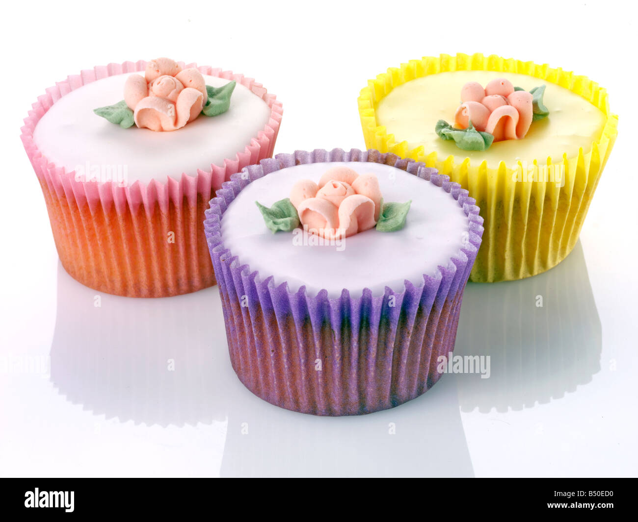 THREE PASTEL CUPCAKES Stock Photo - Alamy