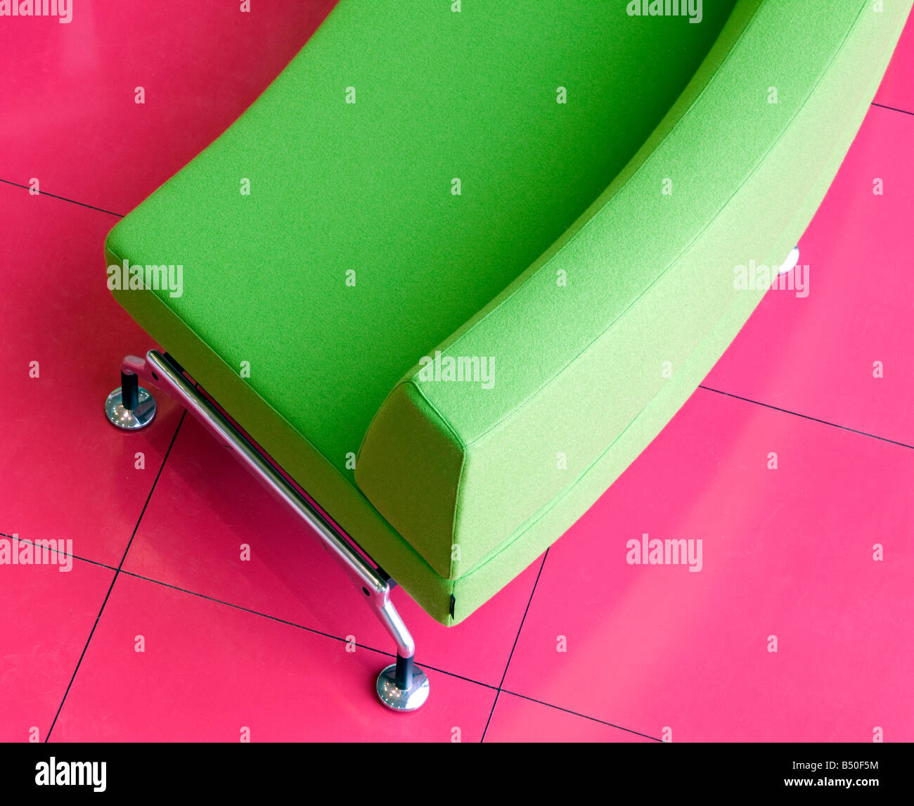 Overhead view of a reception chair against a pink floor Stock Photo - Alamy