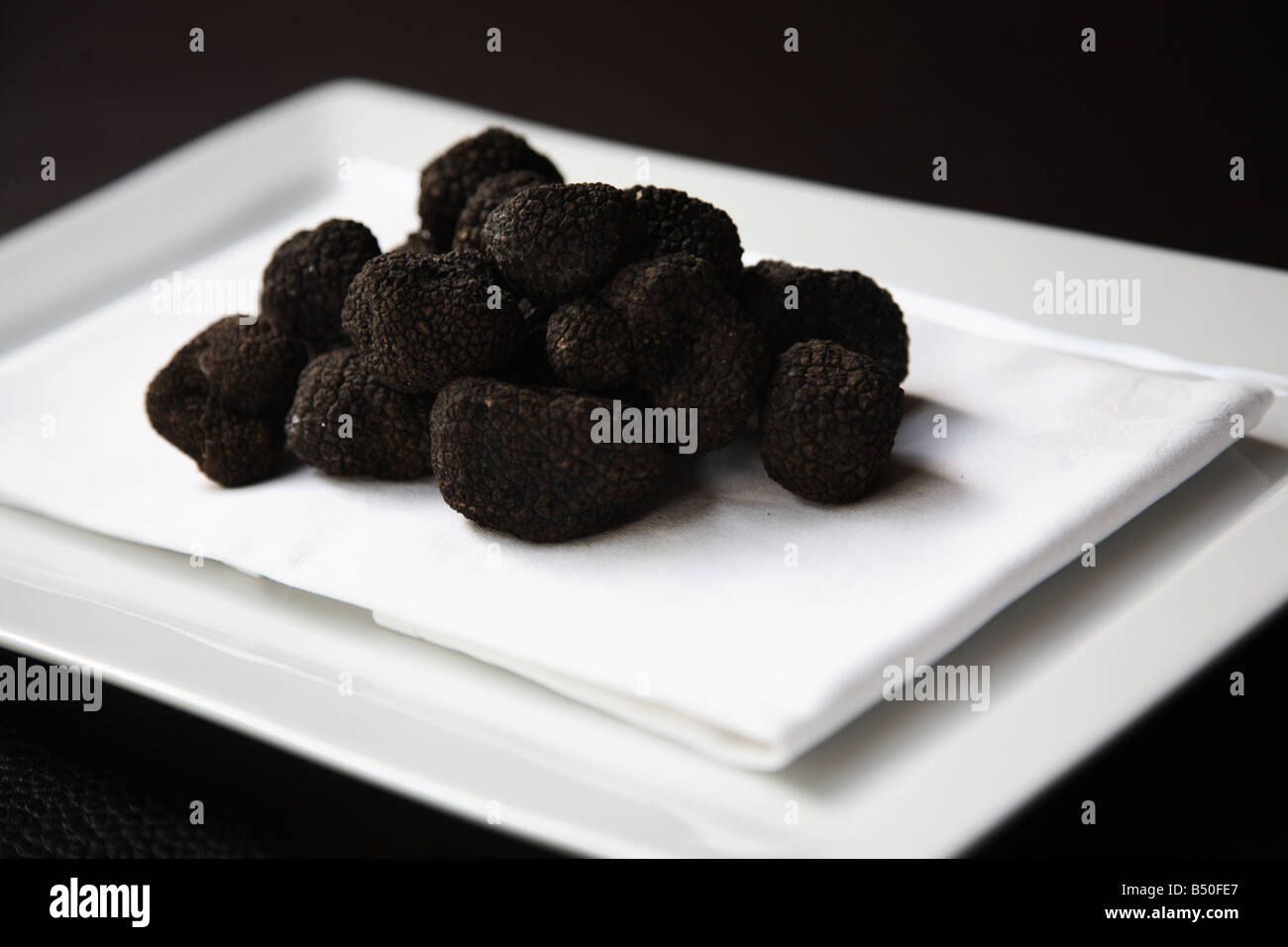 Truffles on a plate Stock Photo - Alamy