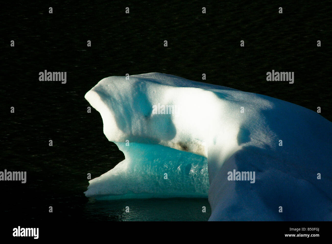 Melting ice from glacier grey Stock Photo - Alamy