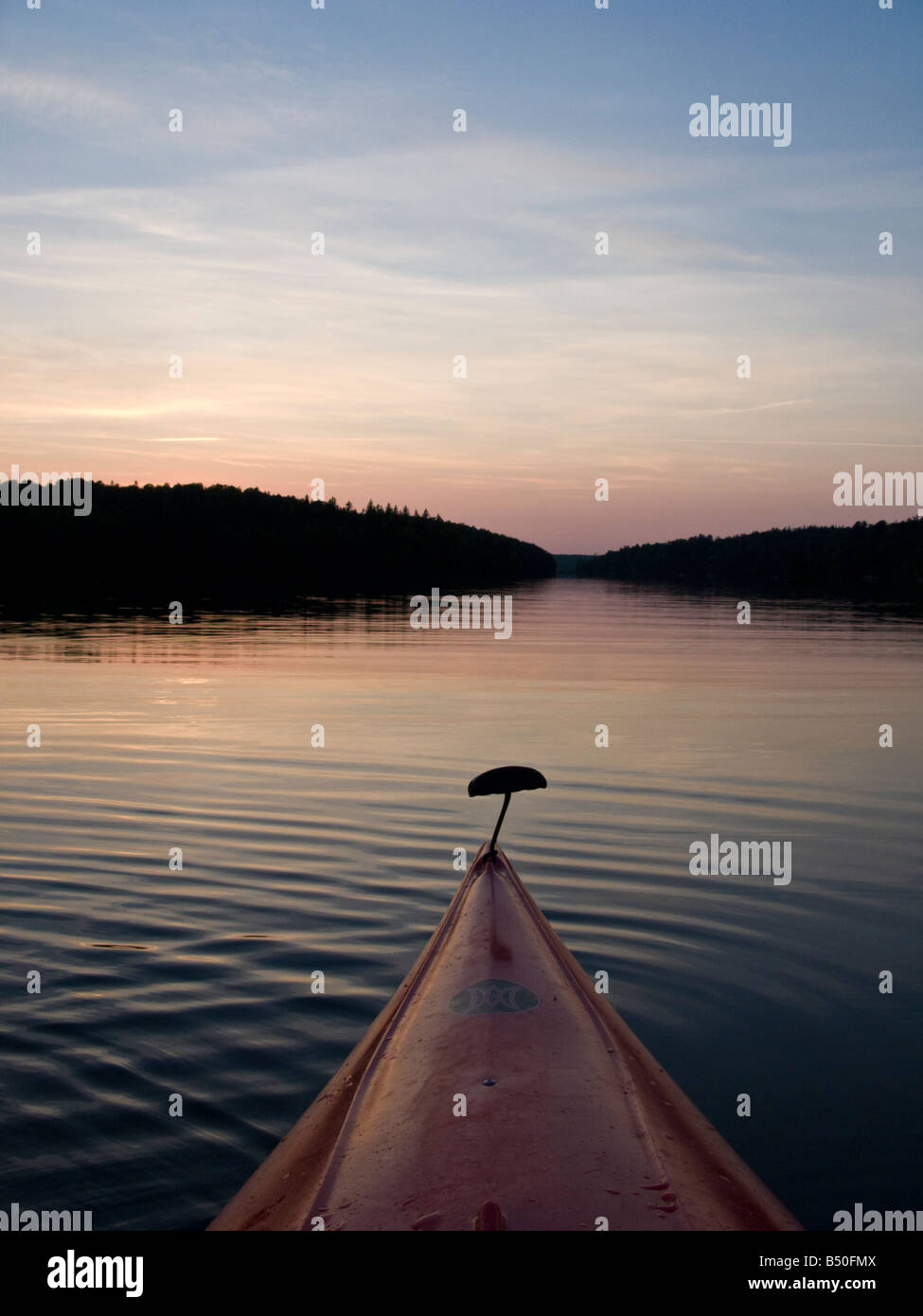 Kayak on st john river new brunswick at twilight heading down the St ...