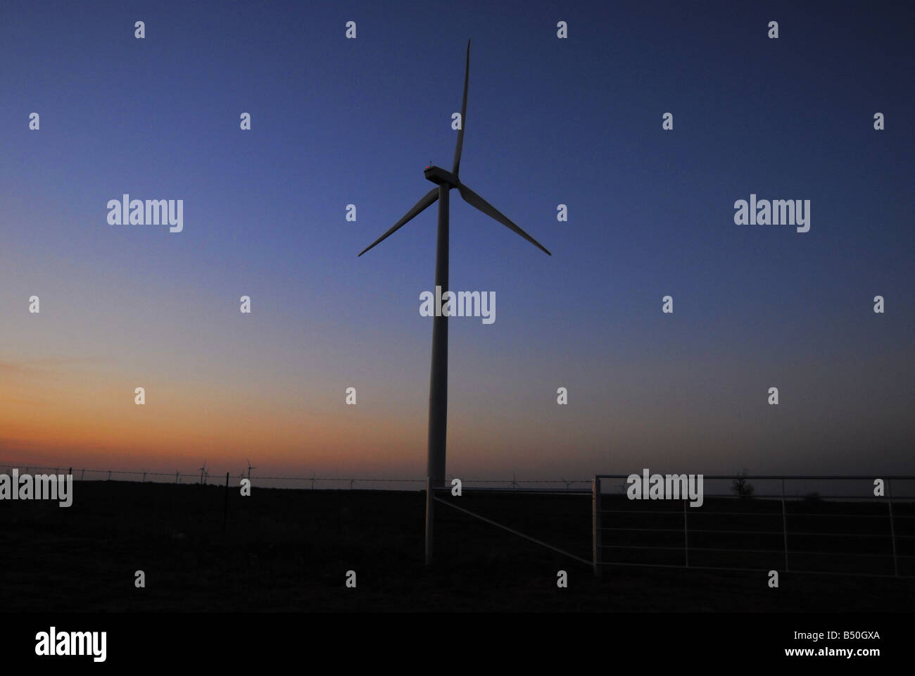 Wind turbines before sunrise at the Blue Canyon Wind Farm in Oklahoma ...