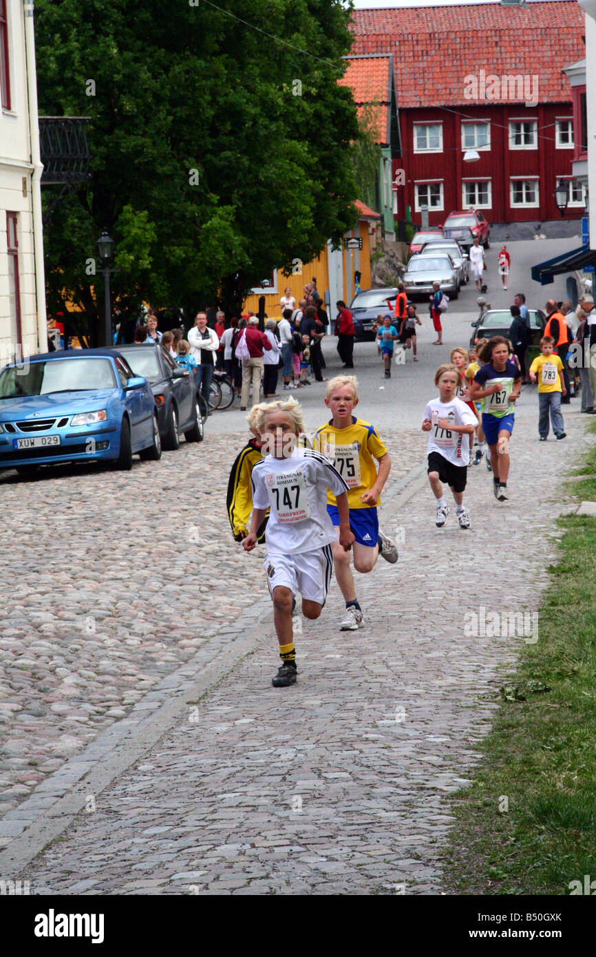 Running street cars hi-res stock photography and images - Alamy