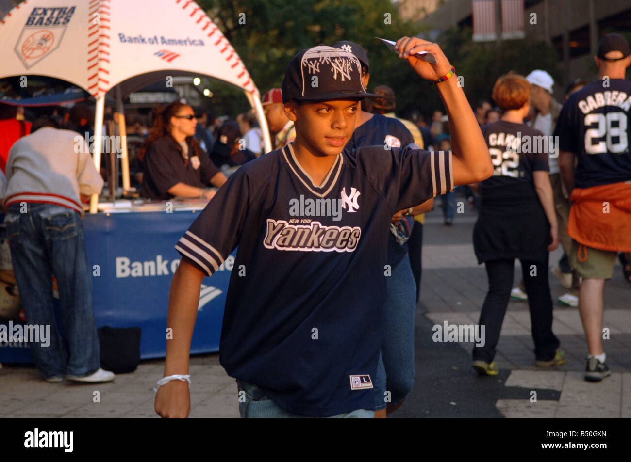 Baseball fans arrive at Yankee Stadium in the New York borough of The ...