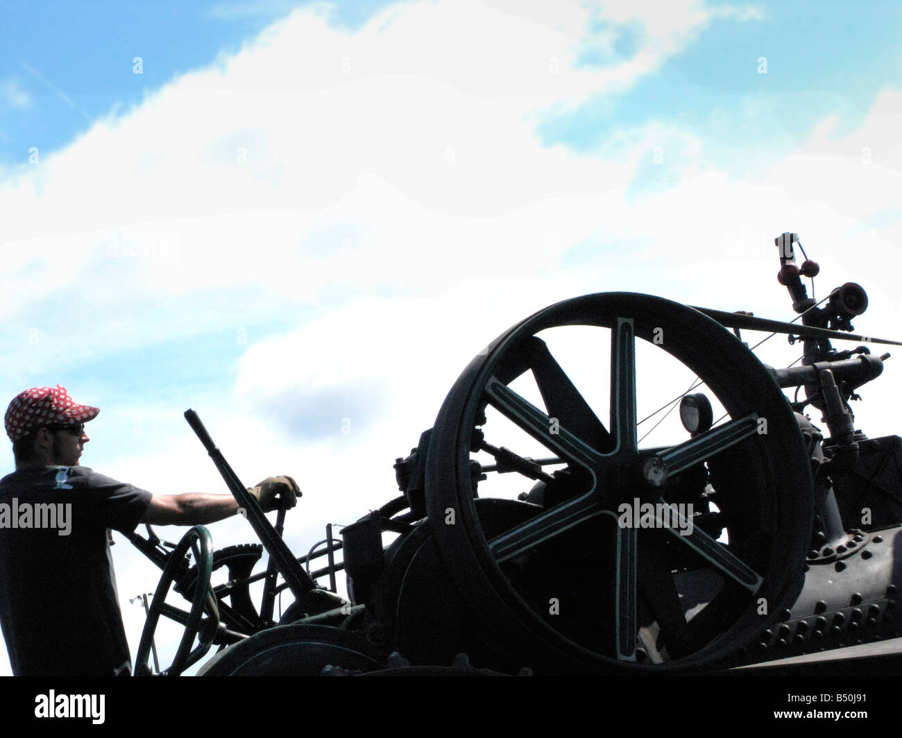 Antique steam powered engine is brought to life in a "Yesteryear ...