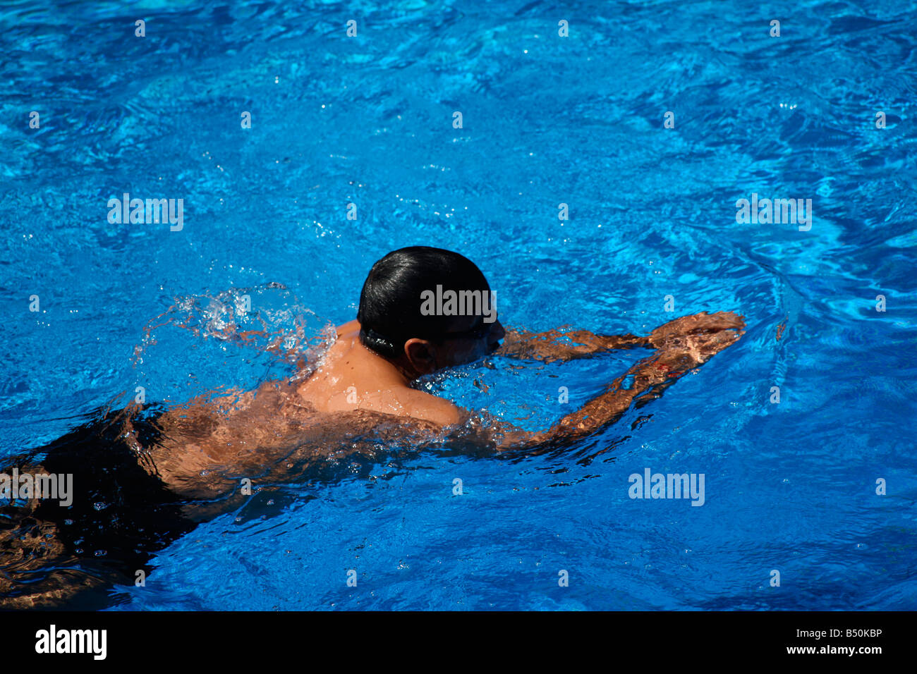 A swimming person Stock Photo - Alamy