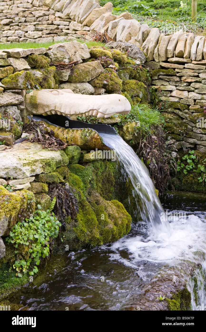 A Cotswold stone conduit in the shape of a crocodile's head in the ...