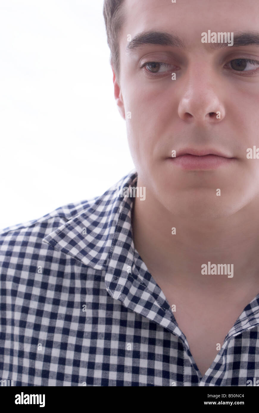 Well toned male model posing partially clothed Stock Photo - Alamy