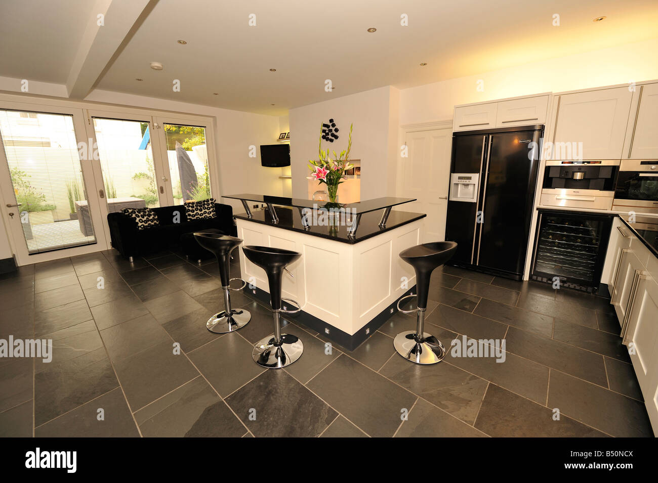 Wide angle shot of a modern kitchen Stock Photo - Alamy