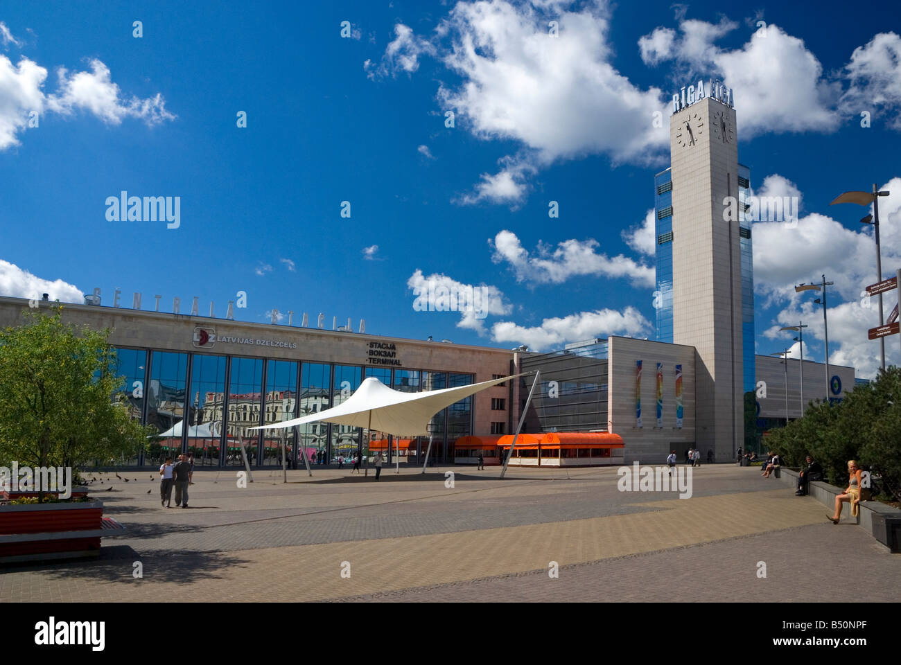 Riga central train station with clock tower Stock Photo - Alamy