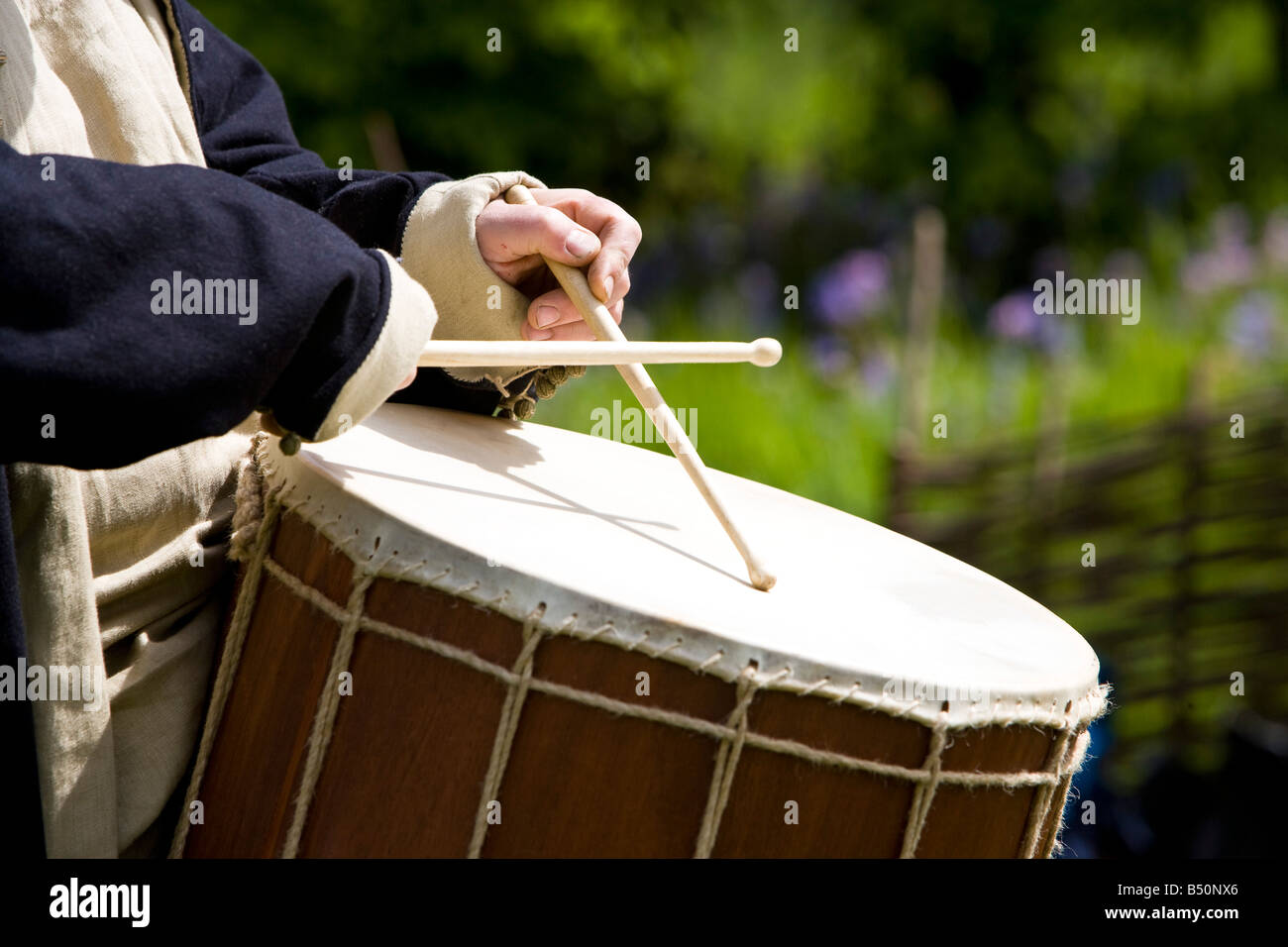 Drummer in traditional costume performing hi-res stock photography and ...
