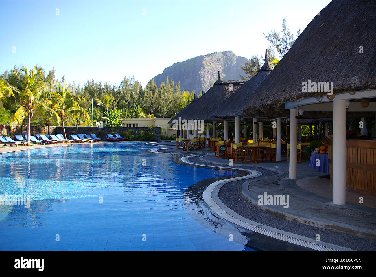 Swimming pool and restaurant at Indian Resort Hotel, SW Mauritius Stock ...